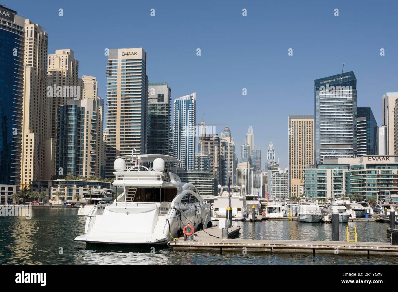 Dubai Marina is a man-made waterfront district with skyscrapers, luxury ...