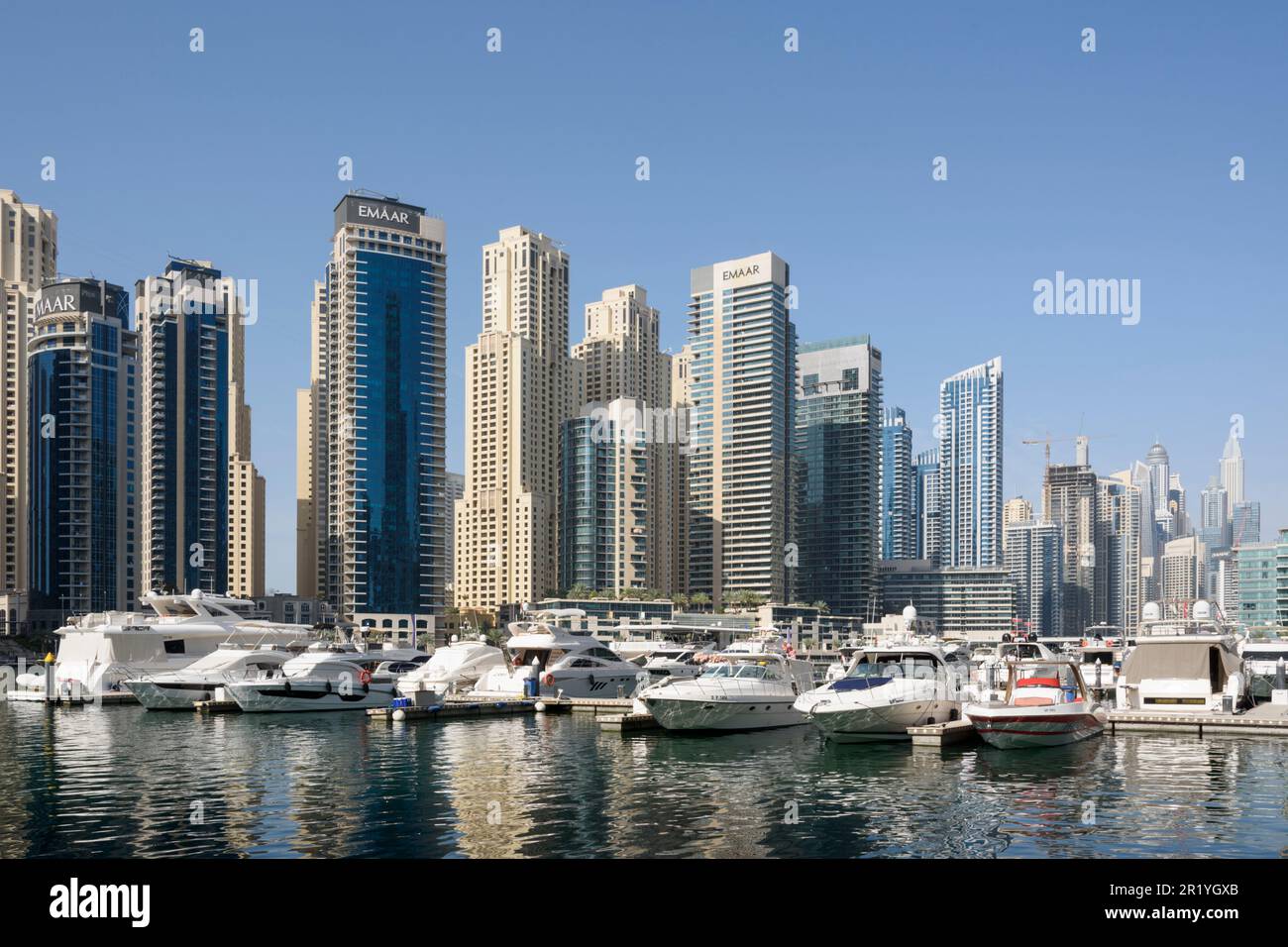 Dubai Marina is a man-made waterfront district with skyscrapers, luxury ...