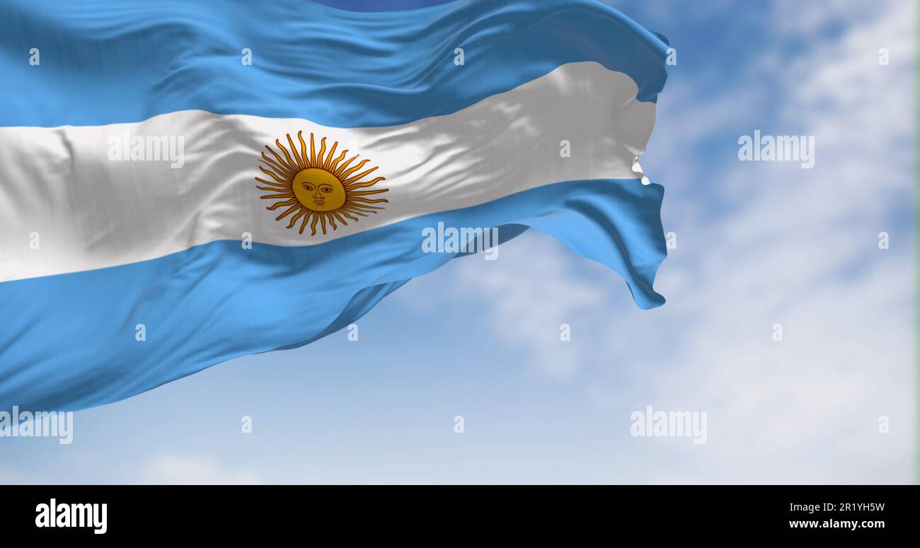 Argentina national flag fluttering in the wind on a sunny day. Three ...