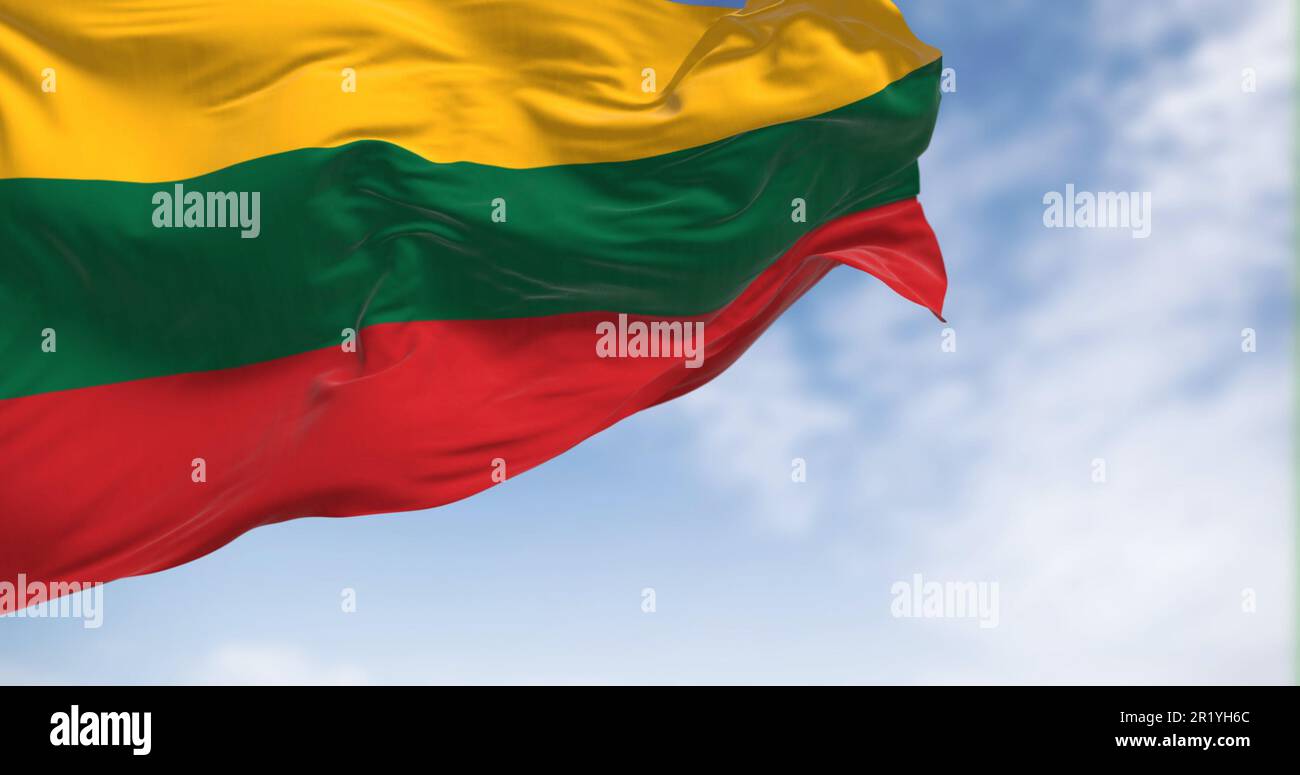 National flag of Lithuania waving in the wind on a clear day ...