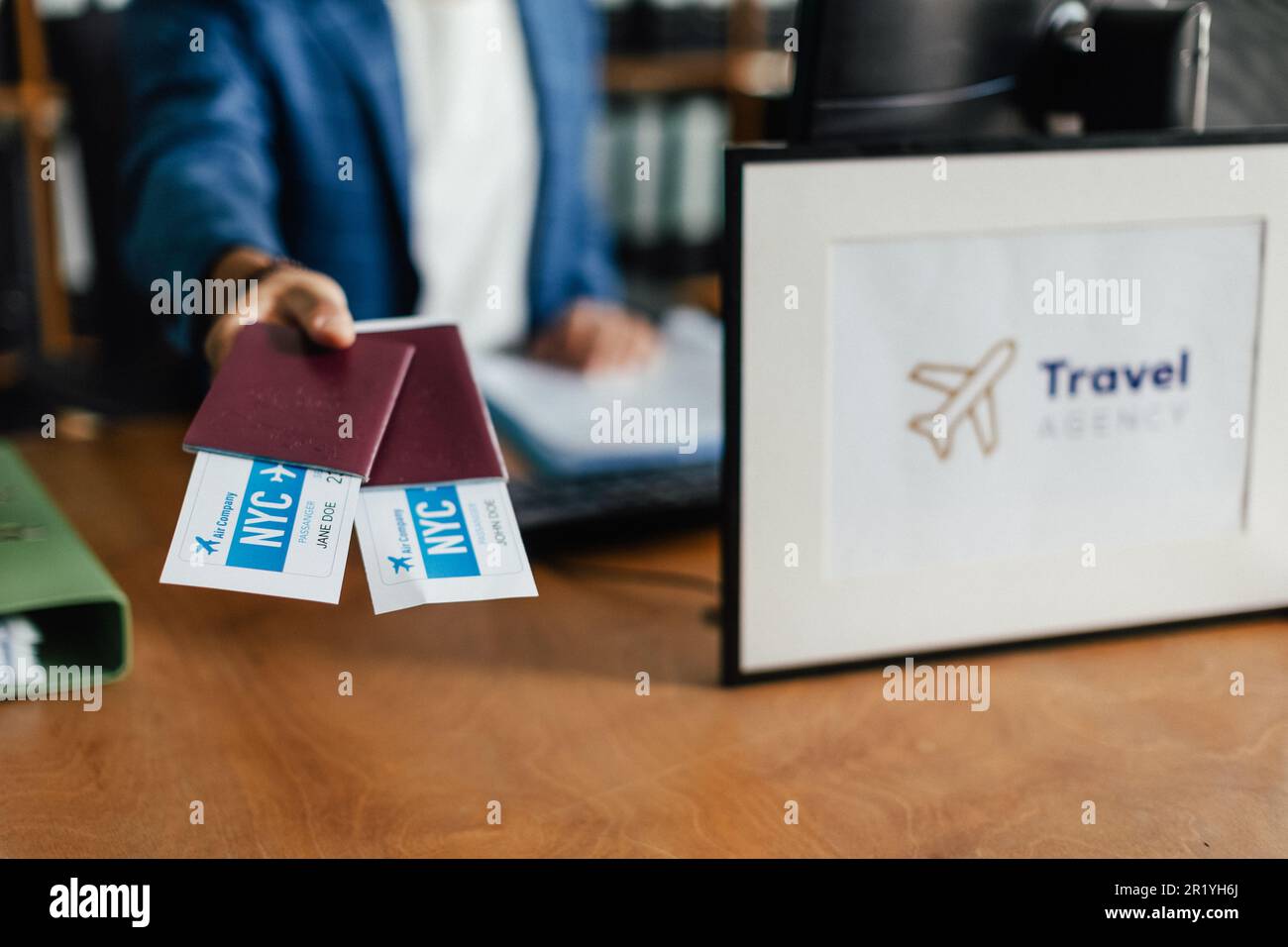Close up of man holding plane tickets, travel agency concept Stock ...