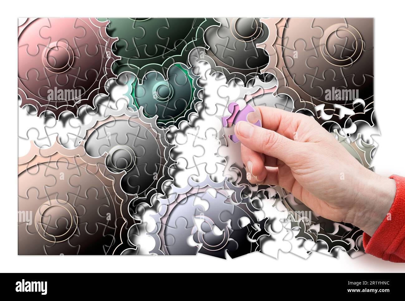 Female hand disassemble and assemble a gear - concept image in puzzle ...