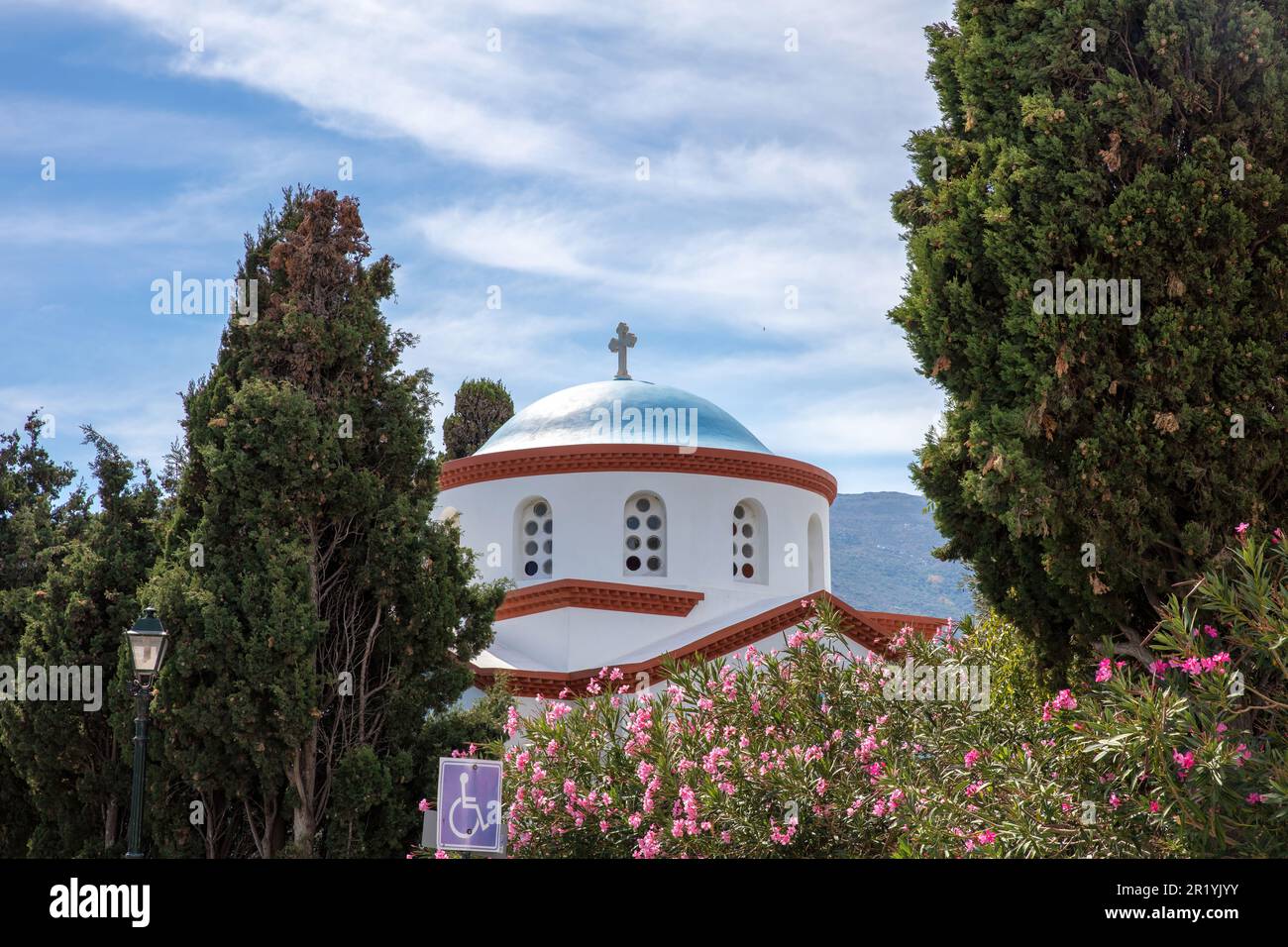 Andros island, Chora town, Cyclades destination Greece. White orthodox ...