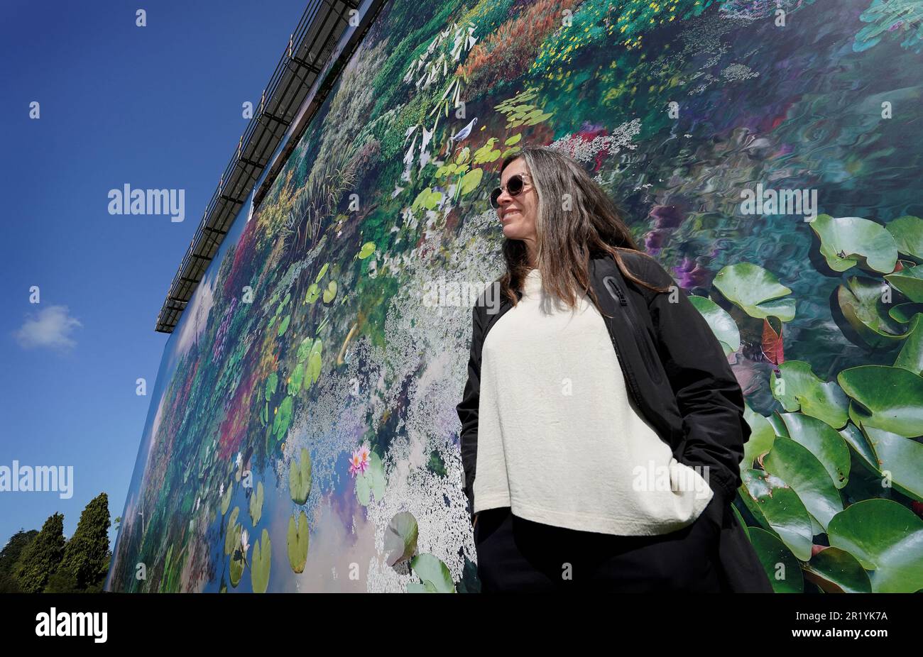 Artist Catherine Nelson poses with her installation Planet Wakehurst ...