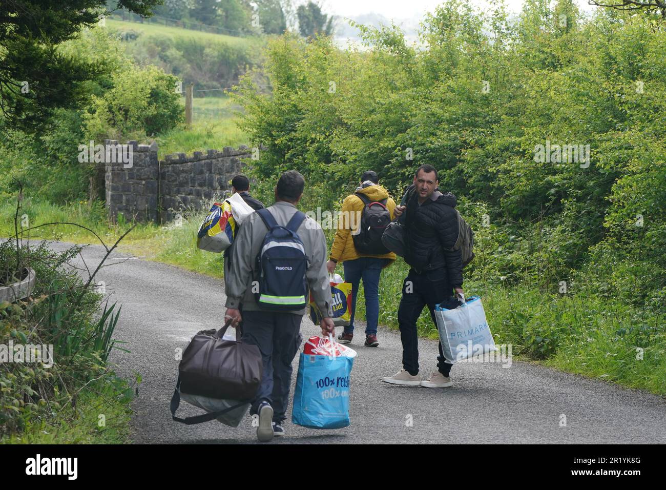 Asylum seekers, who told reporters they were heading for Dublin ...