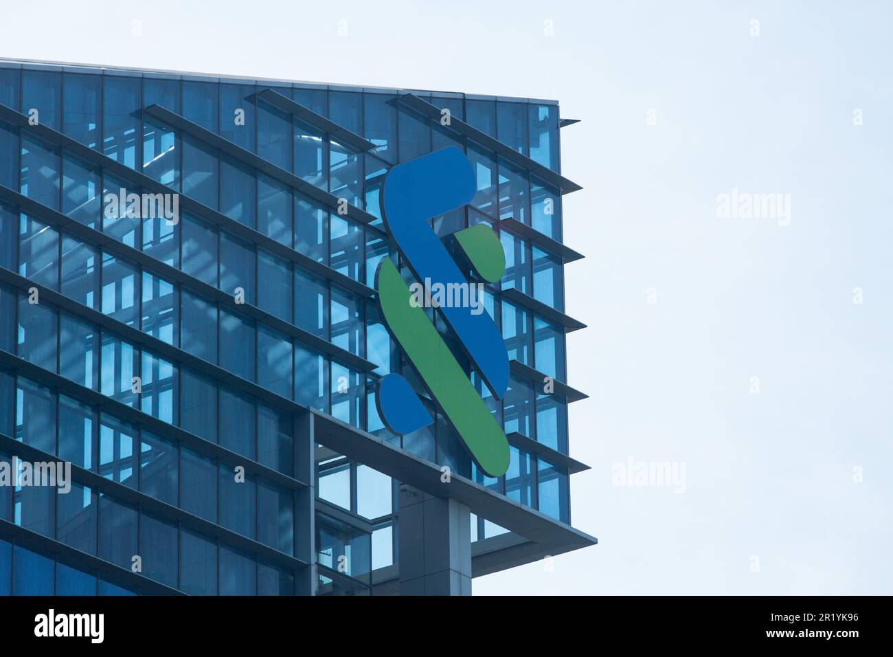 Close up top view of Standard Chartered logo on top of Marina Bay ...