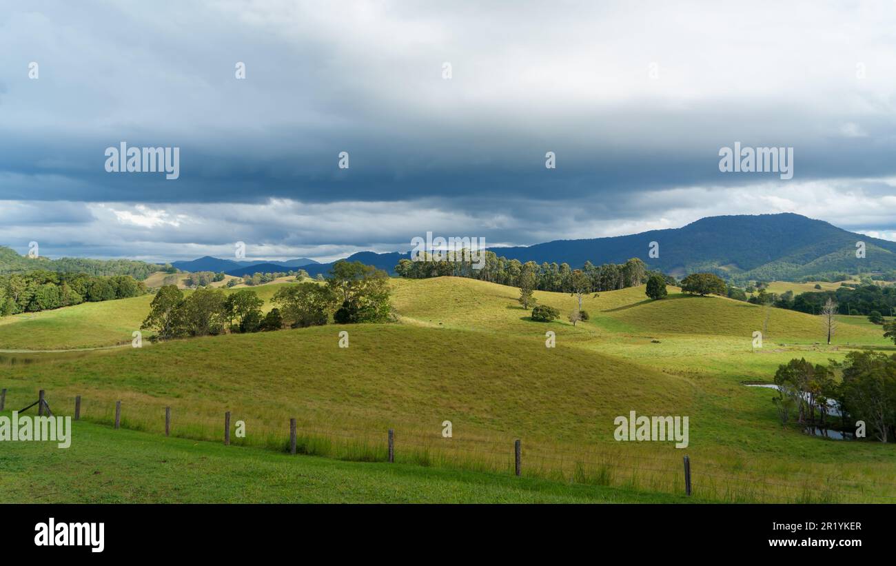 Rural landscape with mountains and grassy hills. Viewed from Tweed ...