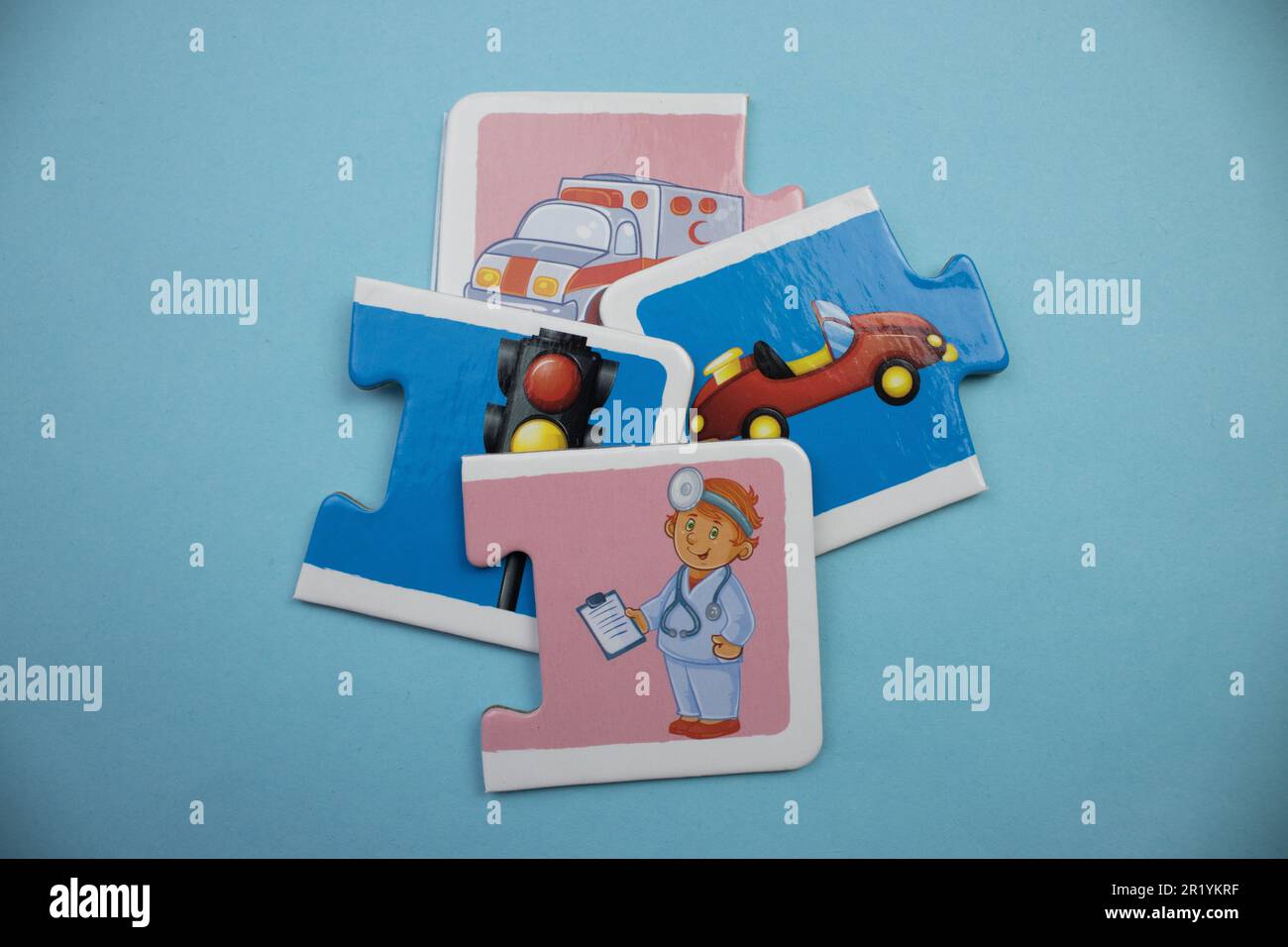 Information puzzles placed on a blue background. Doctor, traffic signs ...
