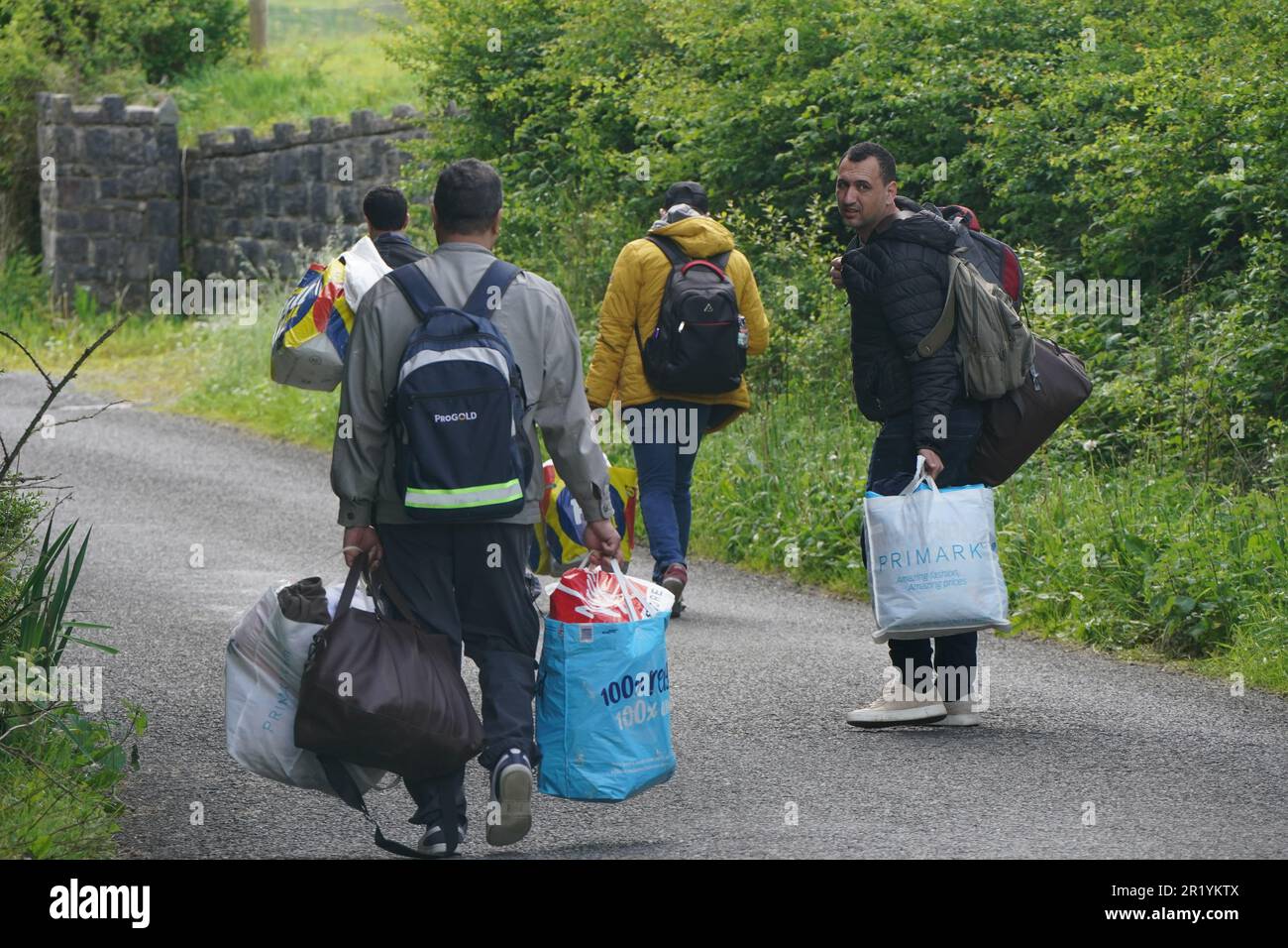 Asylum seekers, who told reporters they were heading for Dublin ...