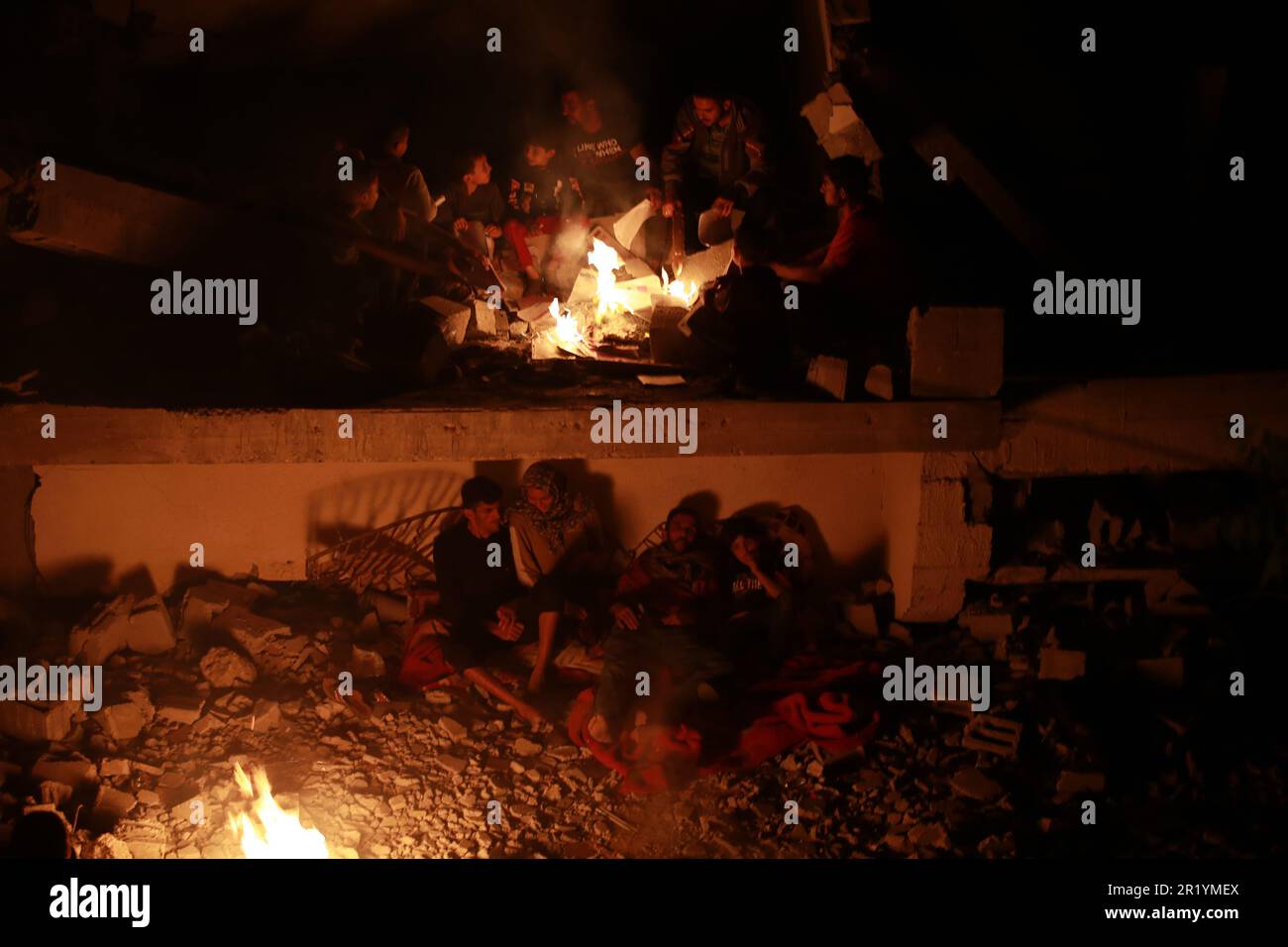 Gaza City, Palestine. 16th May 2023. The Palestinian Nabhan family sits ...