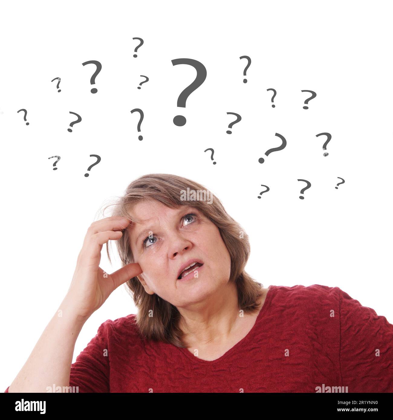 senior woman scratching her head thinking Stock Photo - Alamy