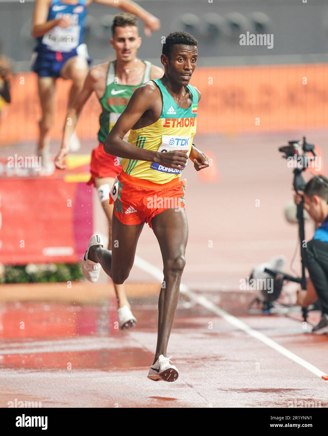 Lamecha Girma participating in the 3000 meter steeplechase at the Doha ...