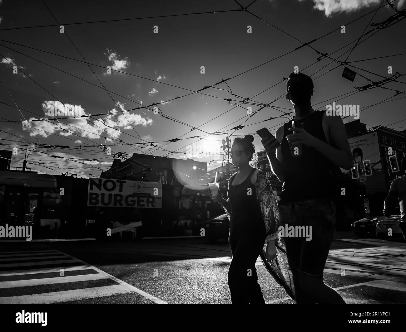 Gen Z couple walking in West Queen West area in Toronto Stock Photo - Alamy