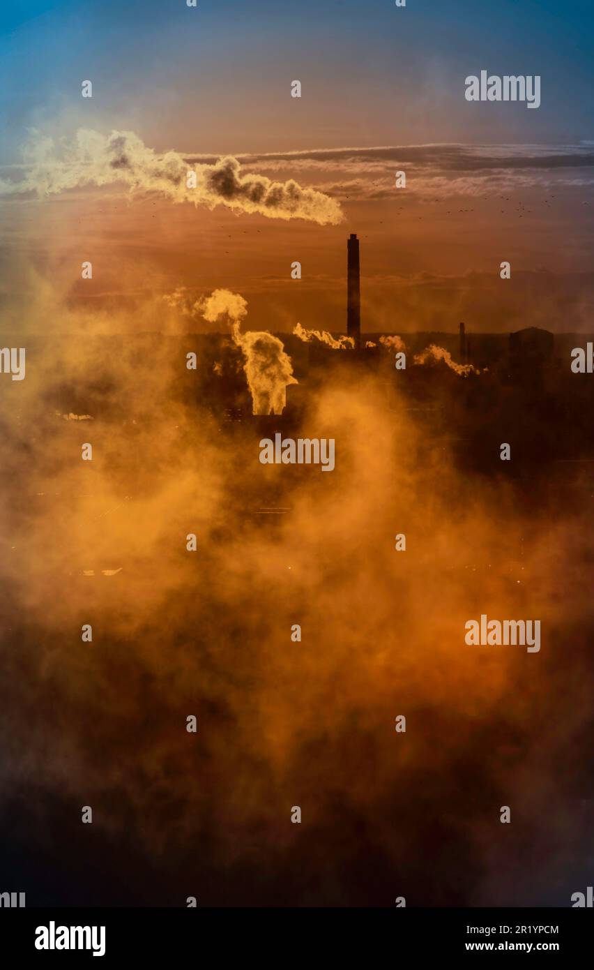 Smoke rising from a factory chimney Stock Photo - Alamy