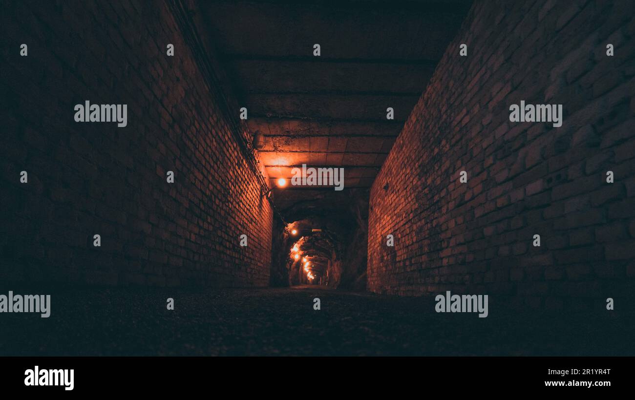 concrete underground tunnel with brick walls Stock Photo - Alamy
