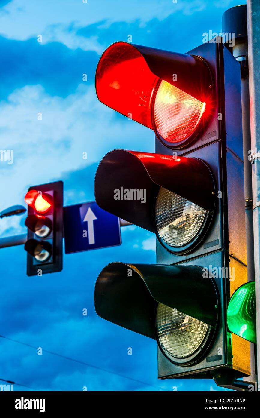 Traffic lights over urban intersection. Red light Stock Photo - Alamy