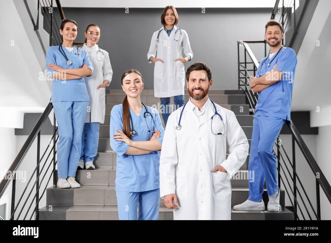 Medical students wearing uniforms on staircase in college Stock Photo ...