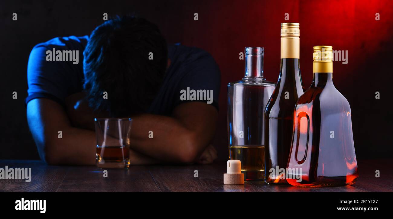 Bottles with alcoholic beverages and the figure of a drunk man Stock ...