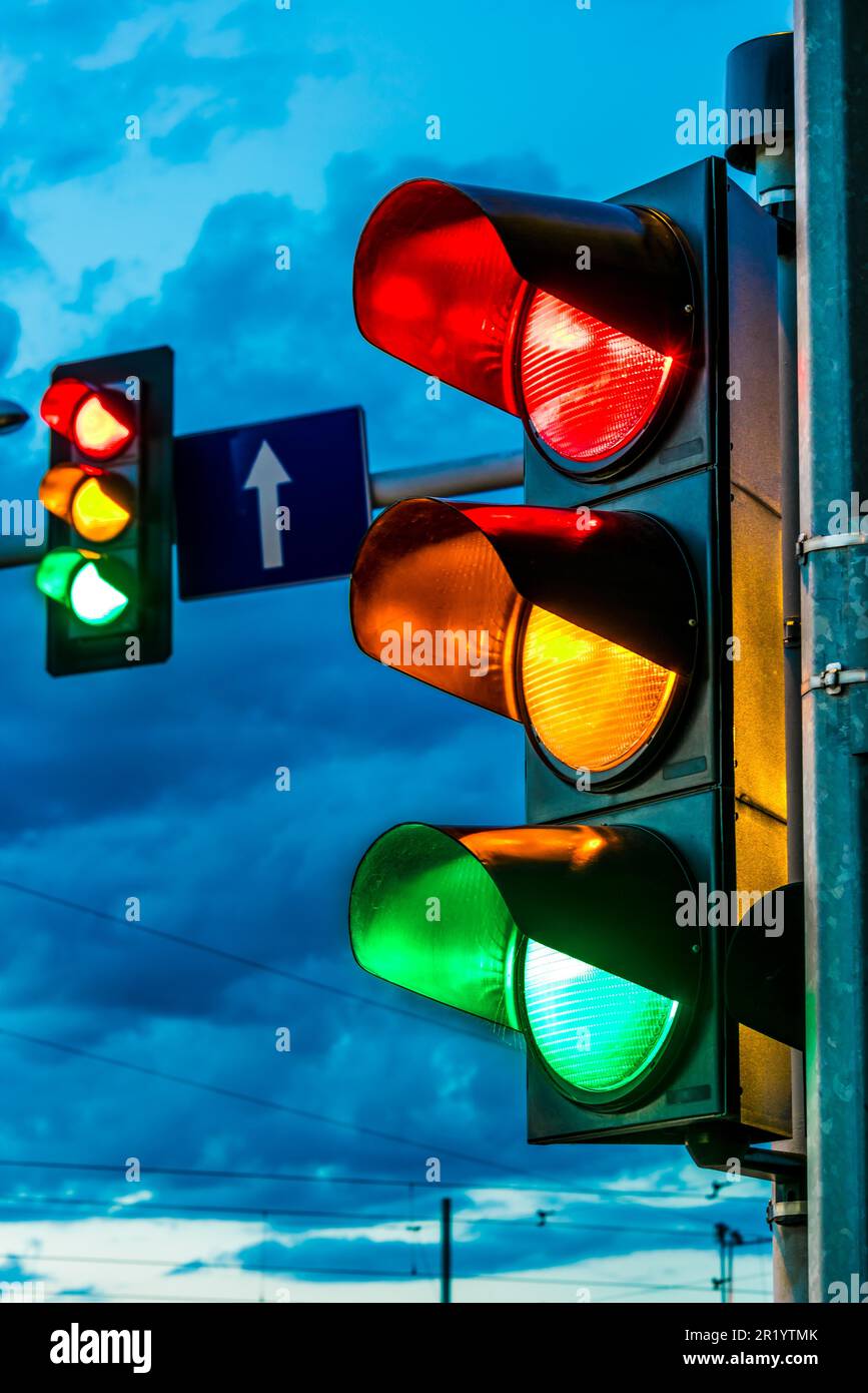 Traffic lights over urban intersection. Red light Stock Photo - Alamy