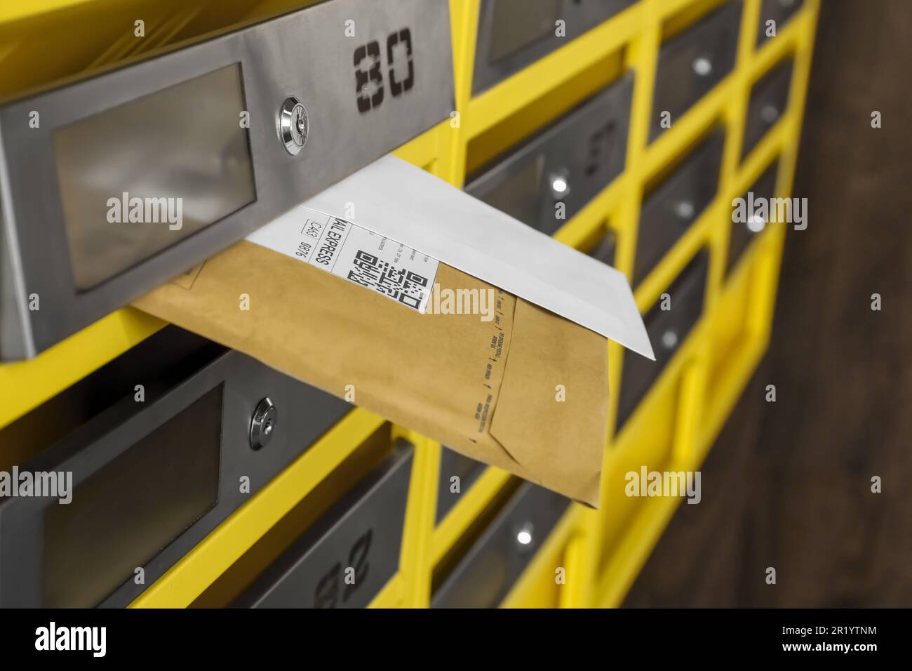 Metal mailboxes with keyholes, numbers and correspondence in post ...