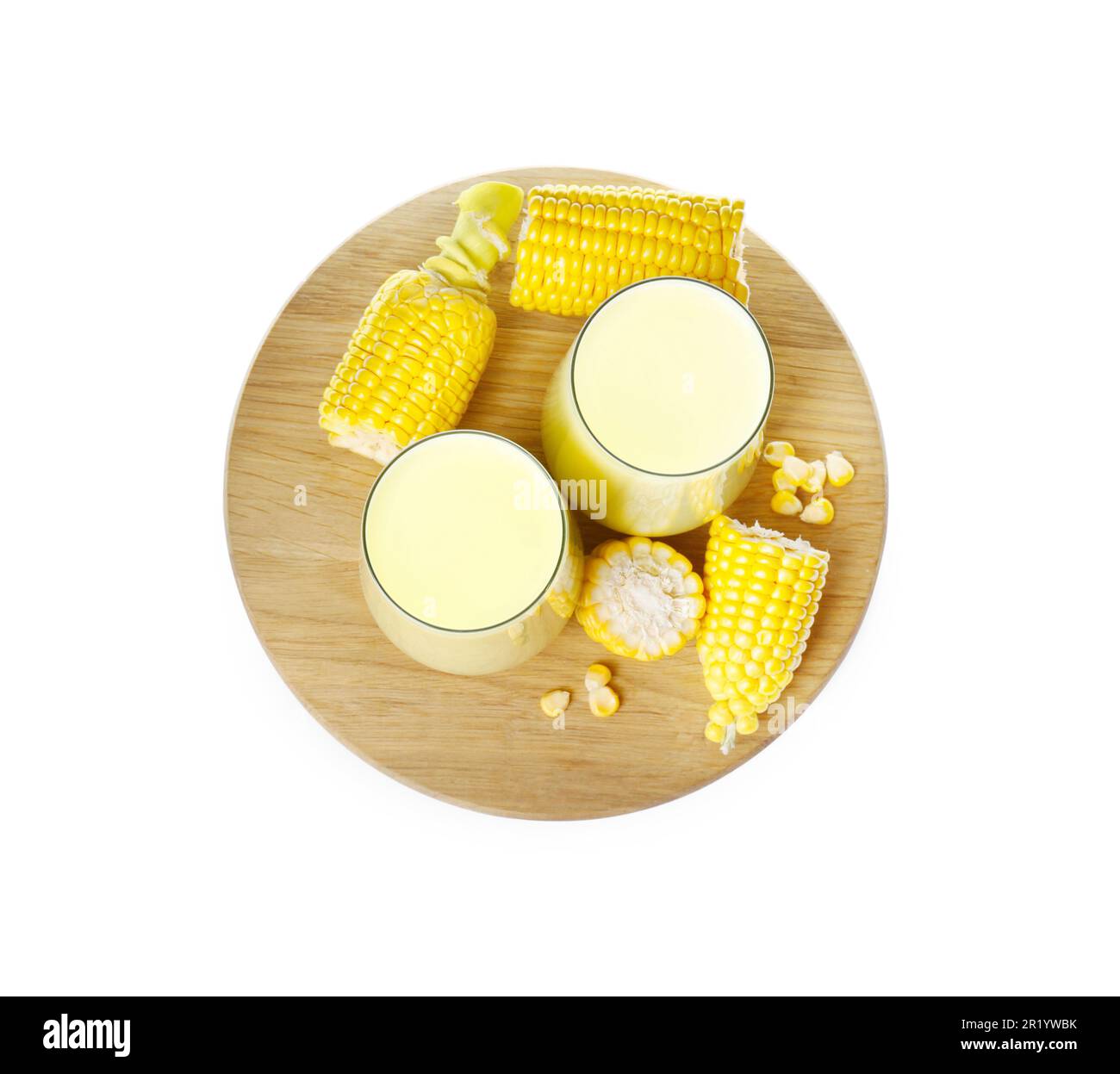 Tasty fresh corn milk in glasses and cobs on white background, top view ...