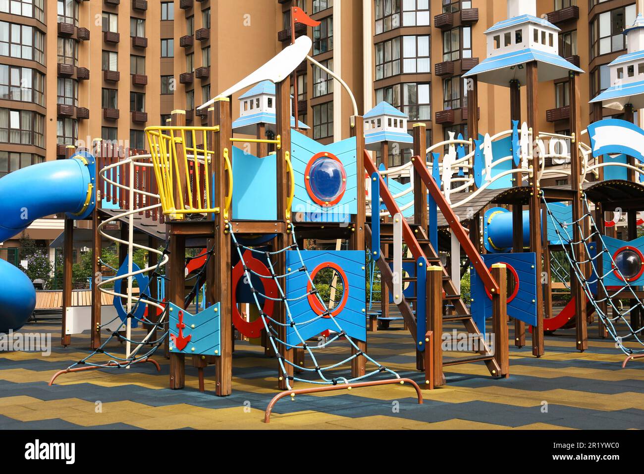 Empty outdoor children's playground in residential area Stock Photo - Alamy