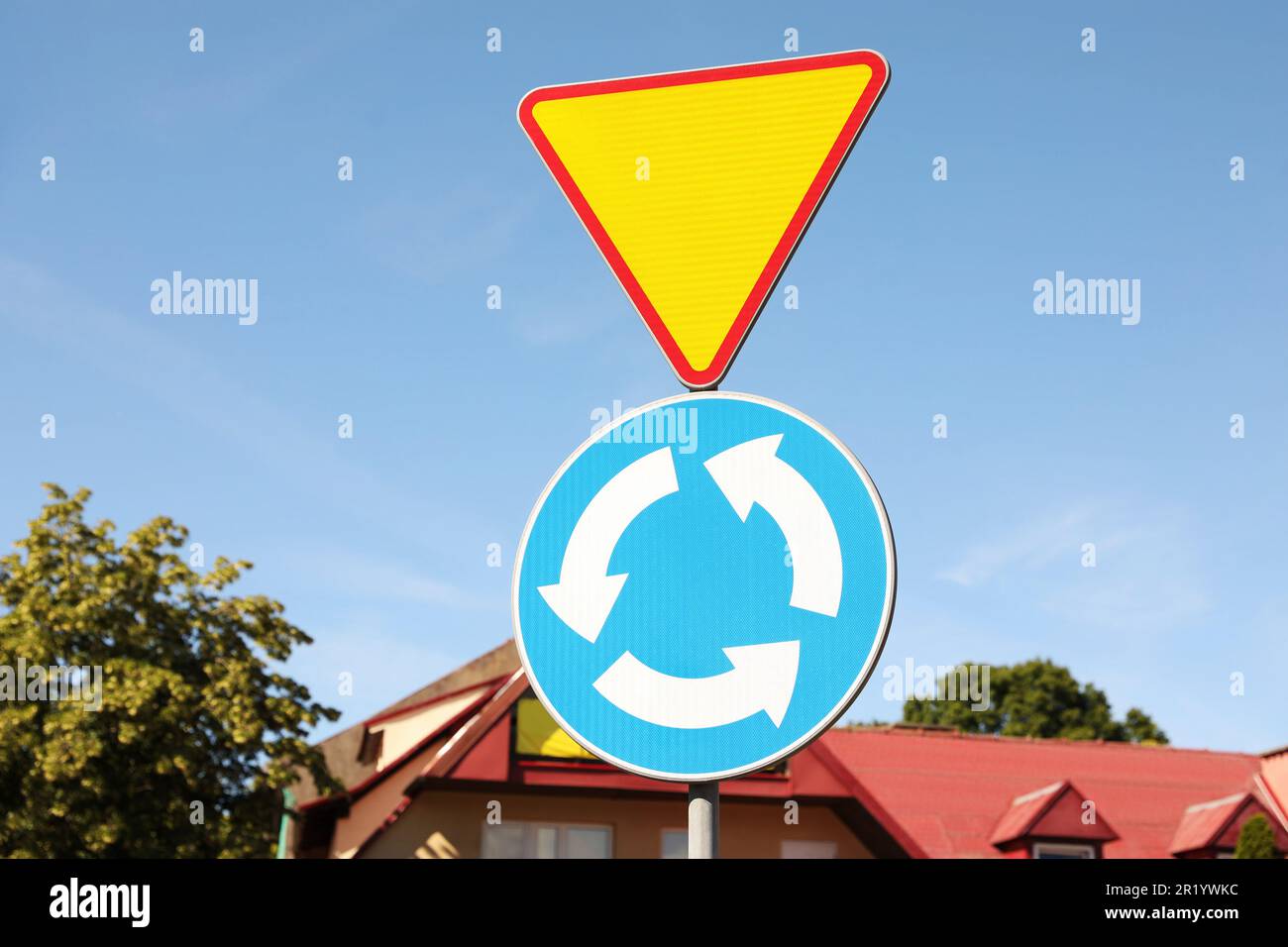 Different road signs on city street. Traffic rules Stock Photo - Alamy