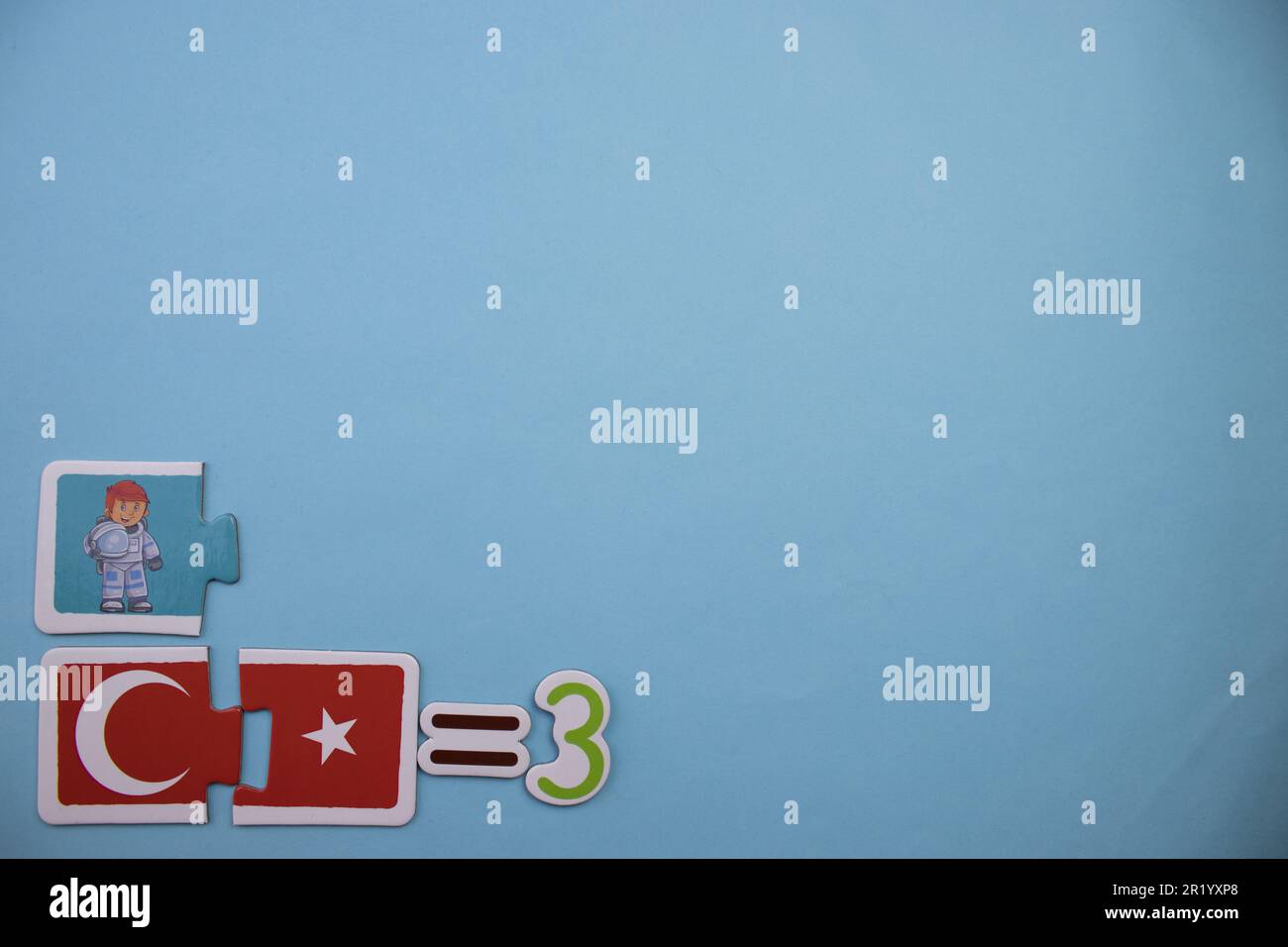 Mathematical operation with educational puzzles placed on the edge of ...