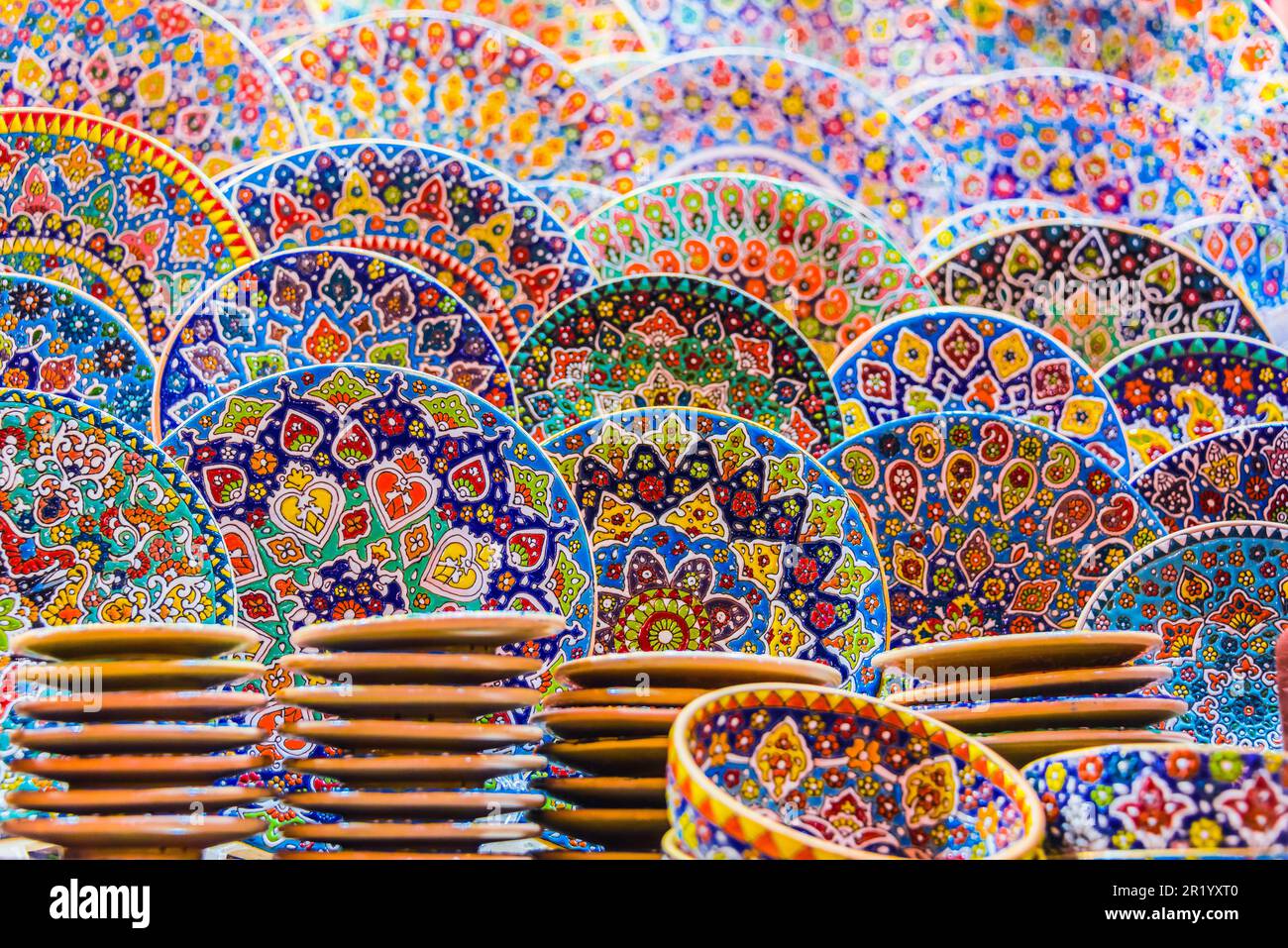Colorful pottery dishes sold in Dubai souk, Unied Arab Emirates Stock ...
