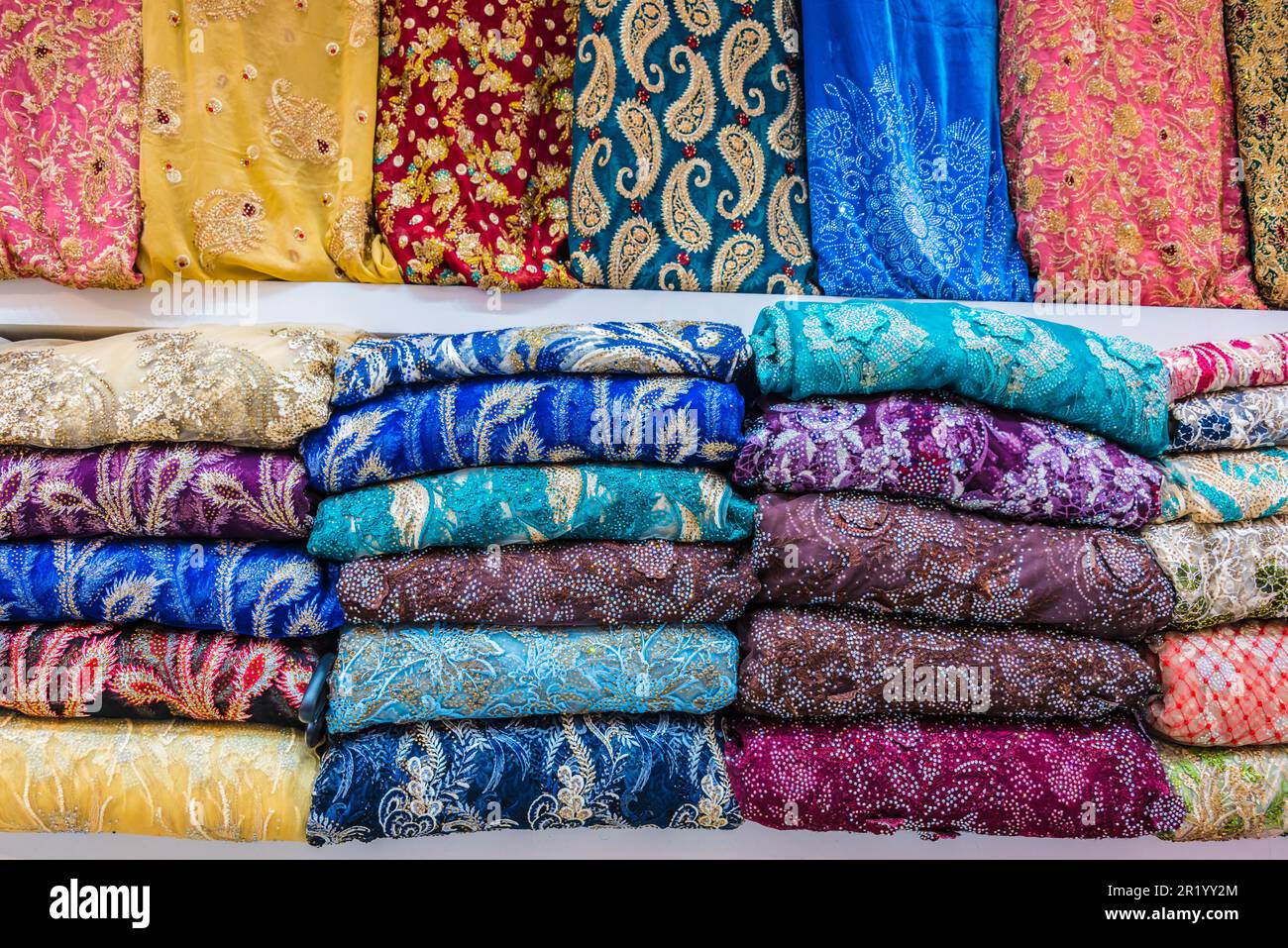 Traditional oriental cloth sold in a store in old town Dubai, United ...