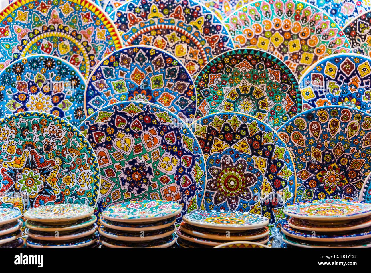 Colorful pottery dishes sold in Dubai souk, Unied Arab Emirates Stock ...