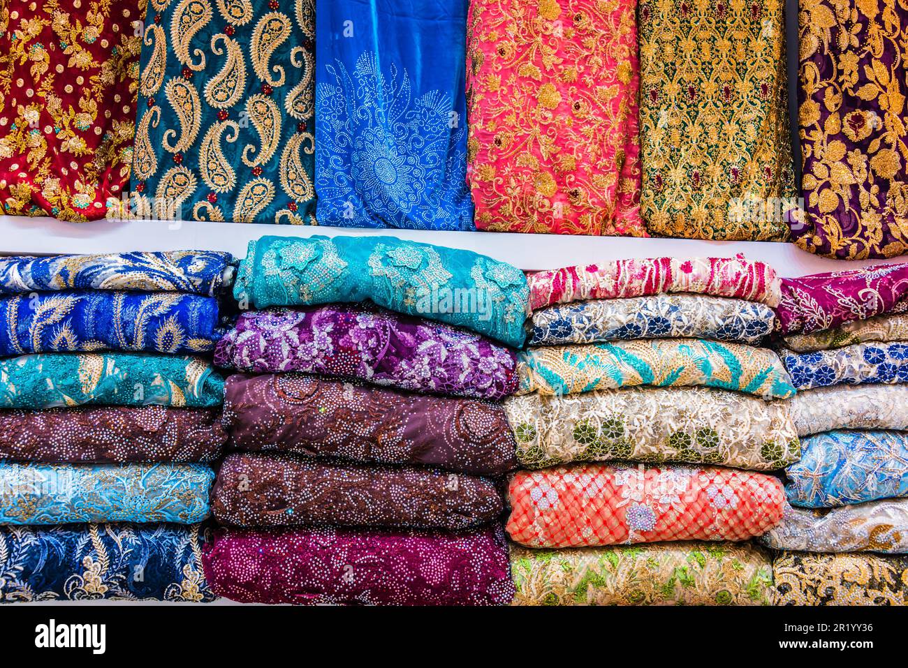 Traditional oriental cloth sold in a store in old town Dubai, United ...