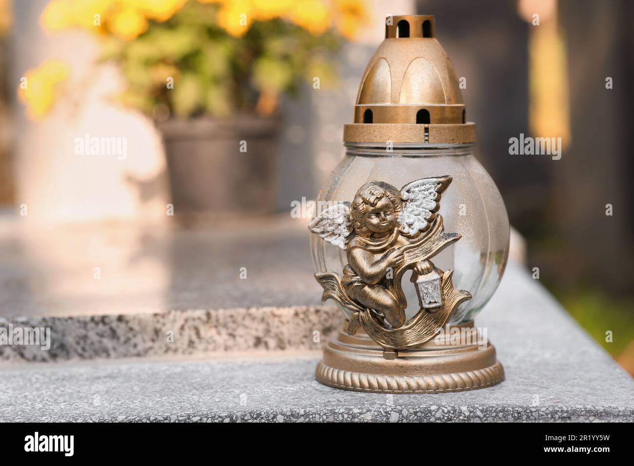 Grave lantern on granite surface in cemetery, space for text Stock Photo - Alamy