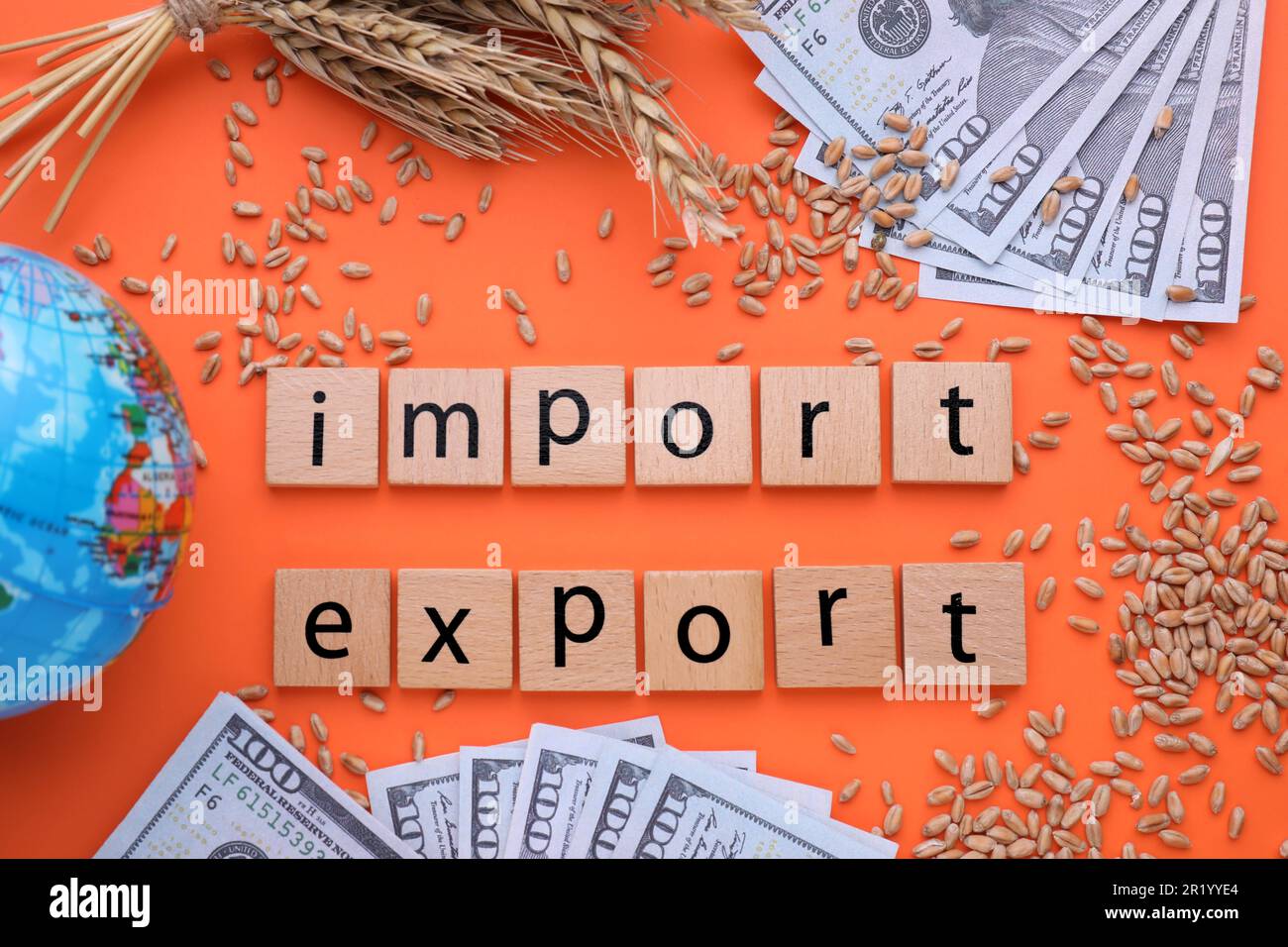 Words Import and Export made of wooden squares, ears of wheat ...