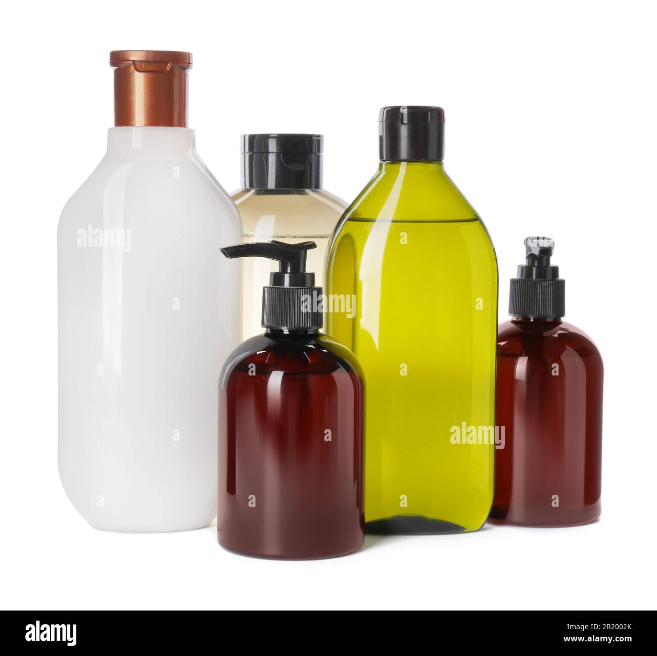 Different bottles of shampoo on white background Stock Photo - Alamy