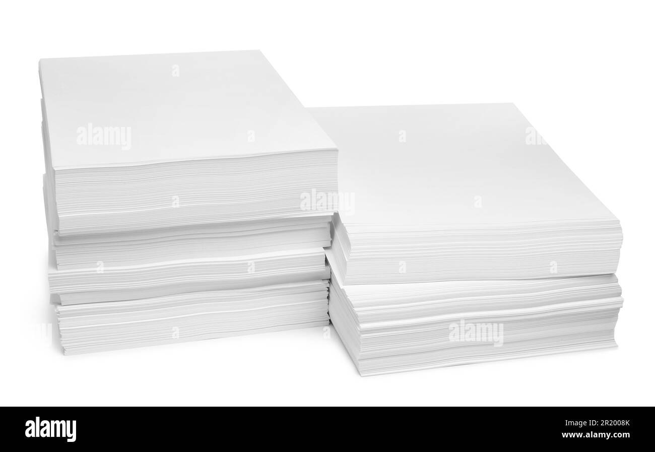 Stacks of paper sheets on white background Stock Photo - Alamy
