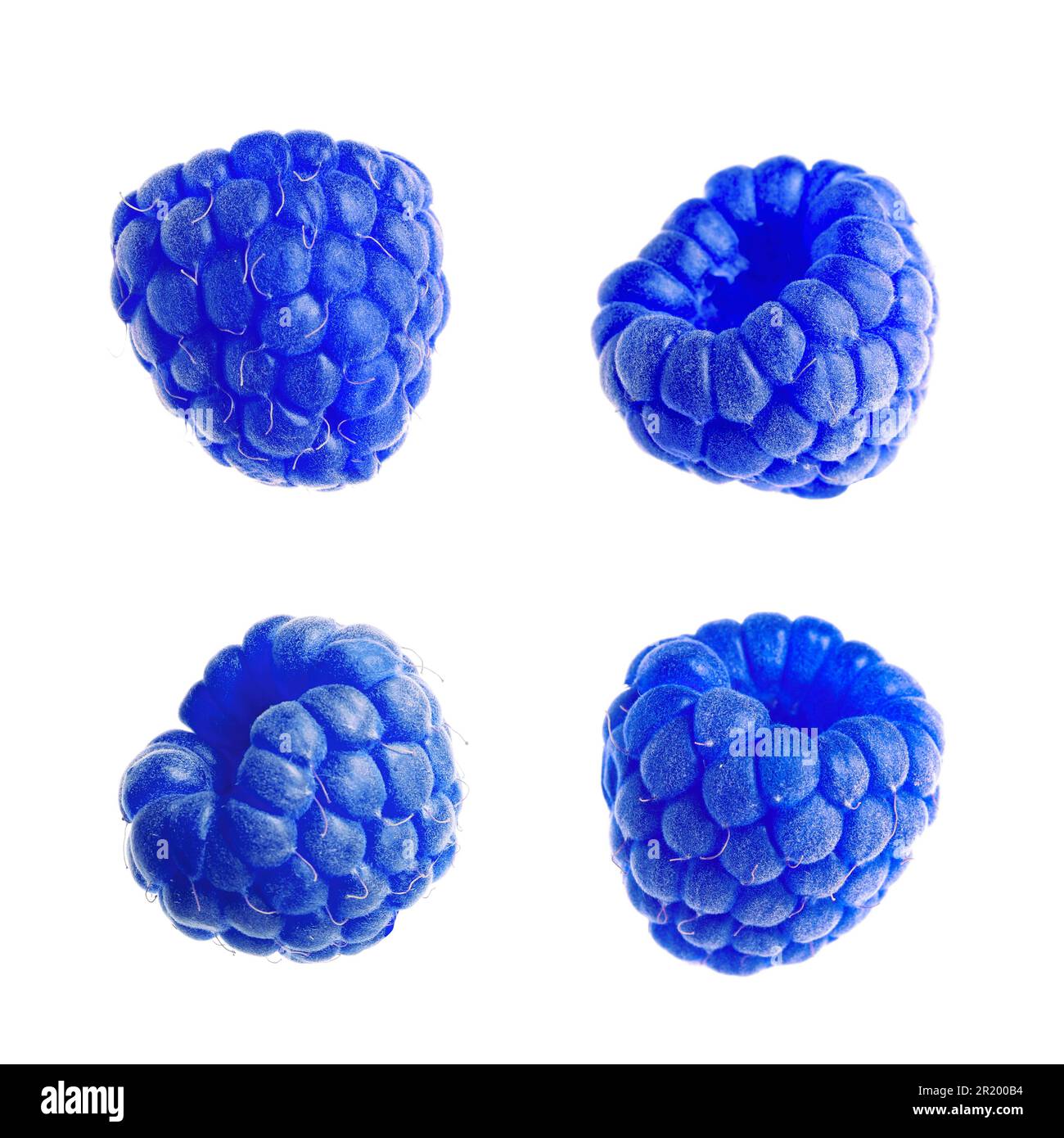 Set with fresh tasty blue raspberries on white background Stock Photo ...