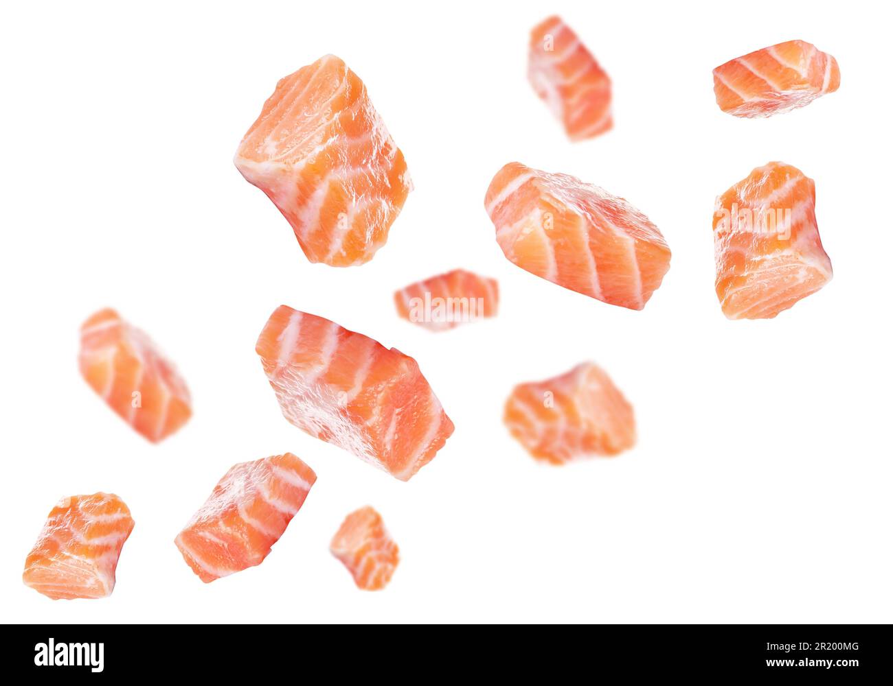 Pieces of fresh raw salmon flying on white background Stock Photo - Alamy