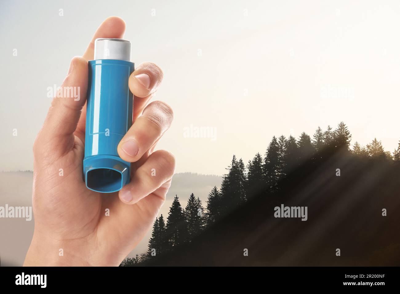 Man with asthma inhaler in mountains, closeup. Emergency first aid ...