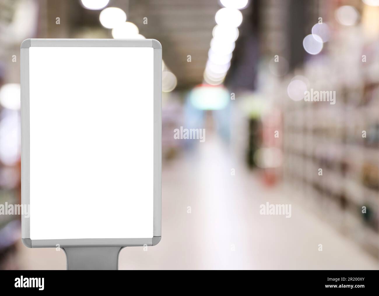 Blank advertising board in supermarket. Mockup for design Stock Photo ...