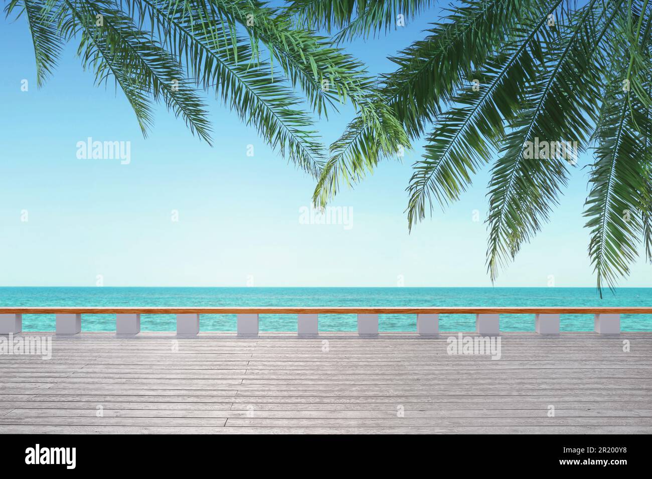 Outdoor wooden terrace under palm trees revealing picturesque view on ...