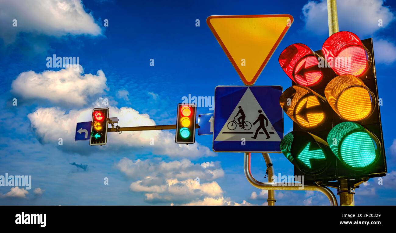 Traffic lights over urban intersection Stock Photo - Alamy