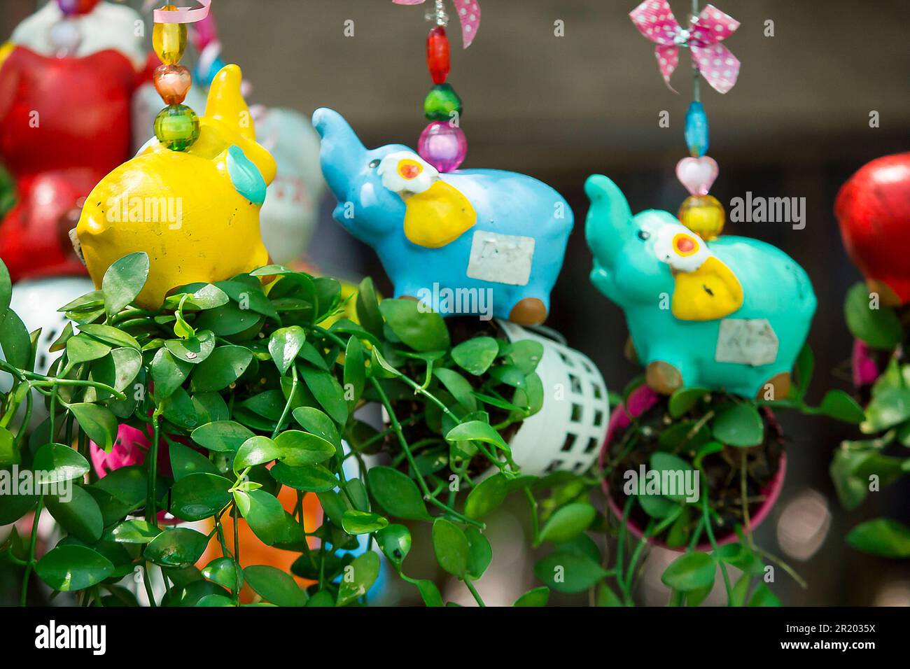 Elephant plant pot used to hang Dave trees Stock Photo - Alamy