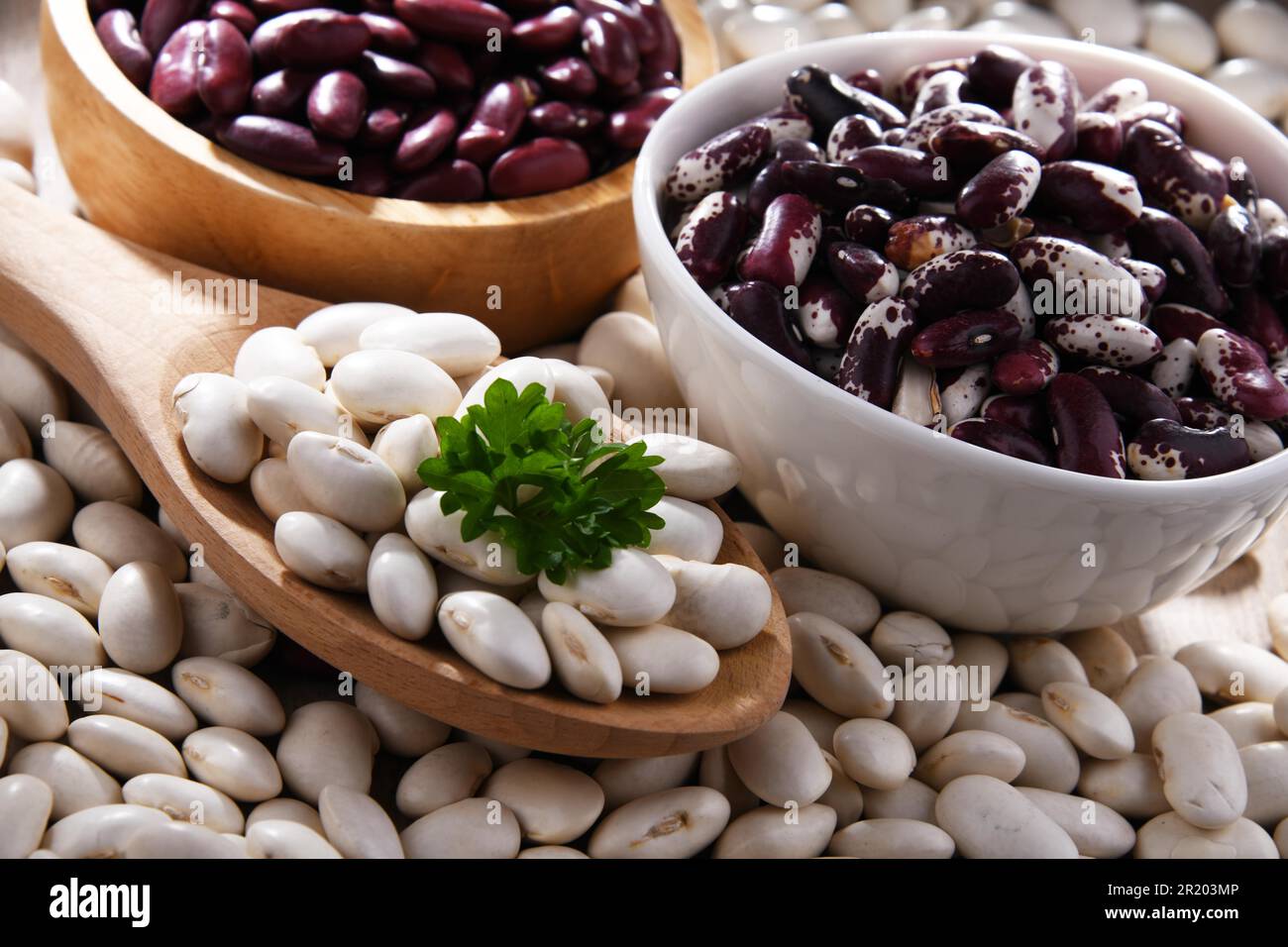 Composition with dried beans on the table Stock Photo - Alamy