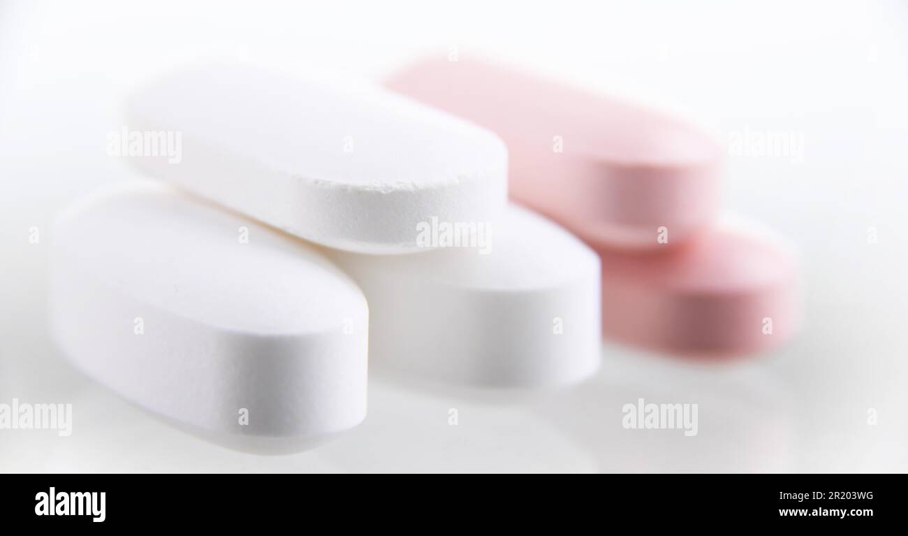 Composition with pharmaceutical drug pills over white background Stock ...