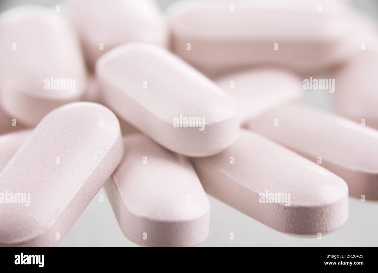 Composition with pharmaceutical drug pills over white background Stock ...