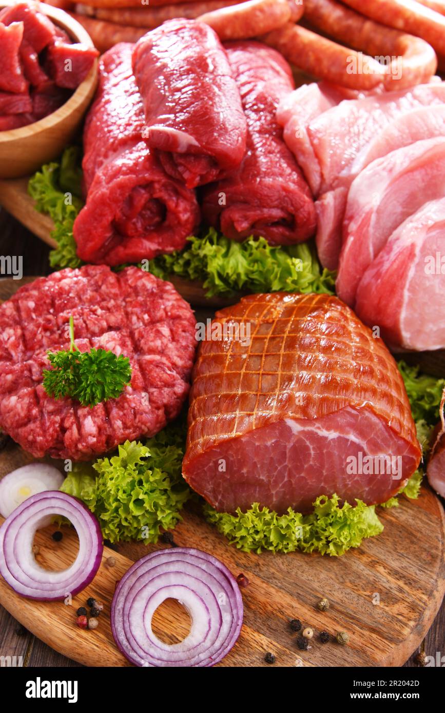 Composition with assorted meat products Stock Photo - Alamy