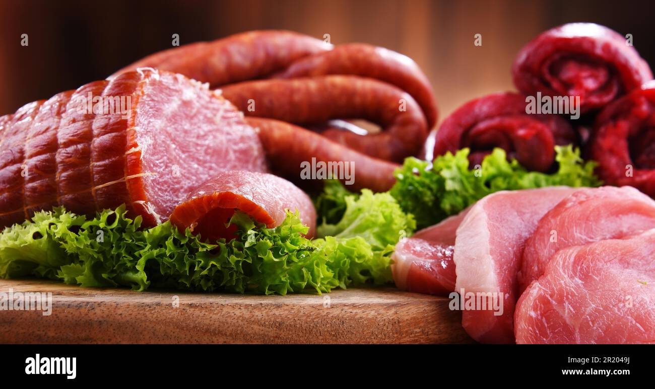 Composition with assorted meat products Stock Photo - Alamy