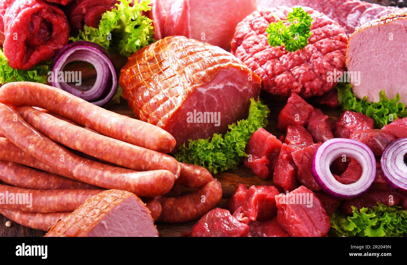 Composition with assorted meat products Stock Photo - Alamy