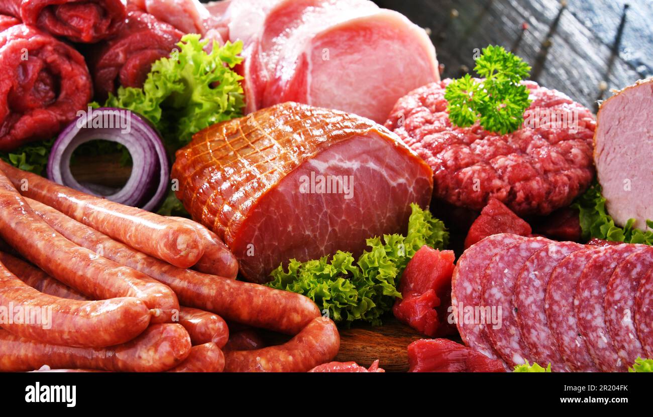 Composition with assorted meat products Stock Photo - Alamy
